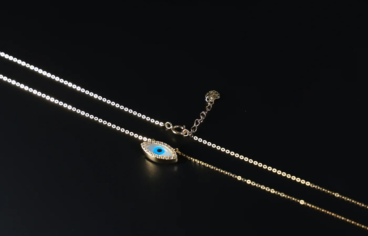 What Does Evil Eye Jewelry Means? | Charlie & Co. Jewelry